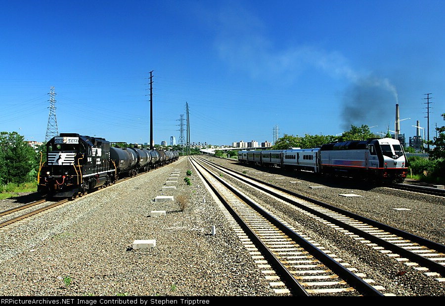 NS 5614 pulls west as NJT 4011? pushes east.